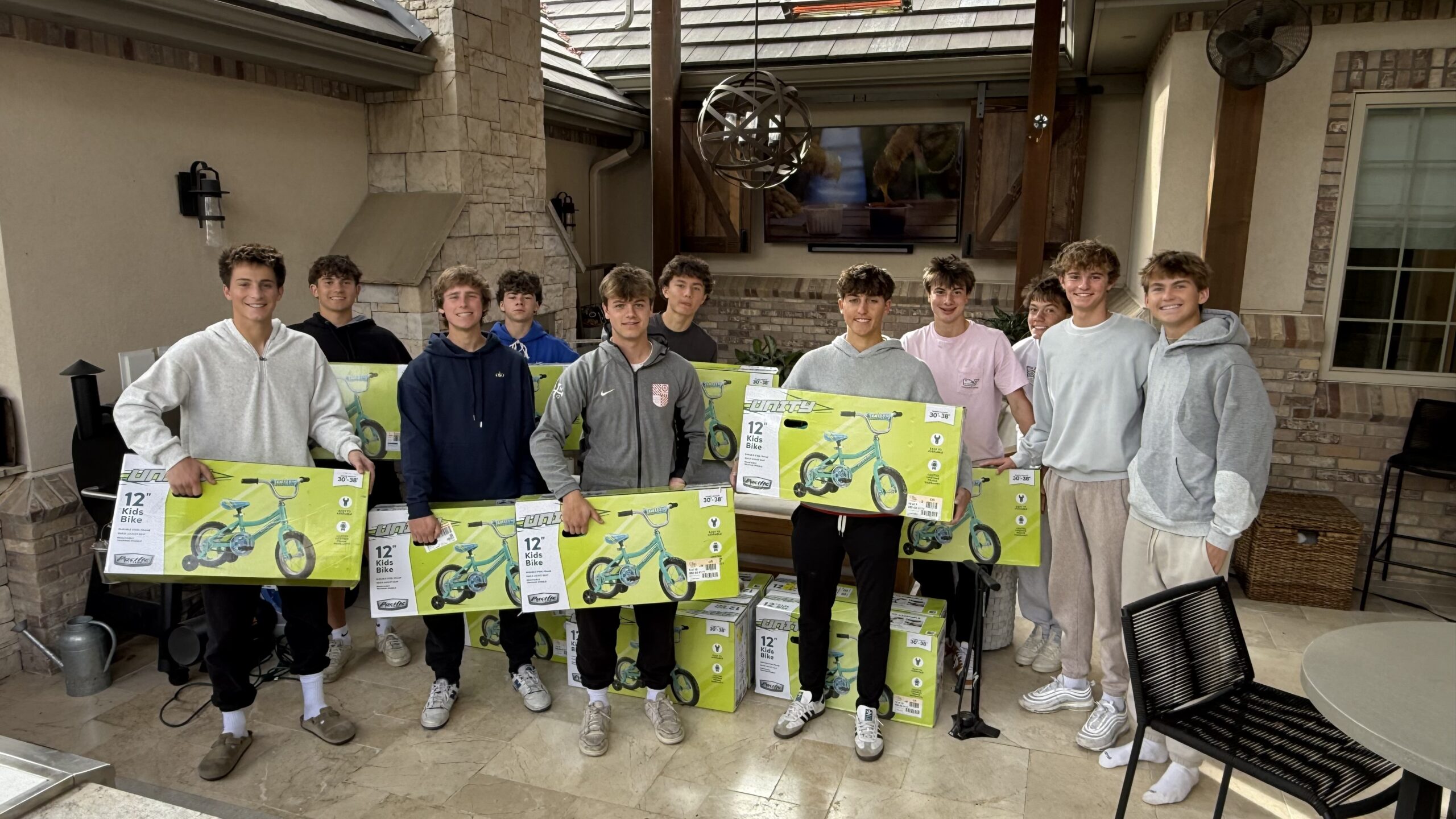 Kicking Goals Off the Field: Regis Jesuit Boys Soccer Team Builds Bikes ...